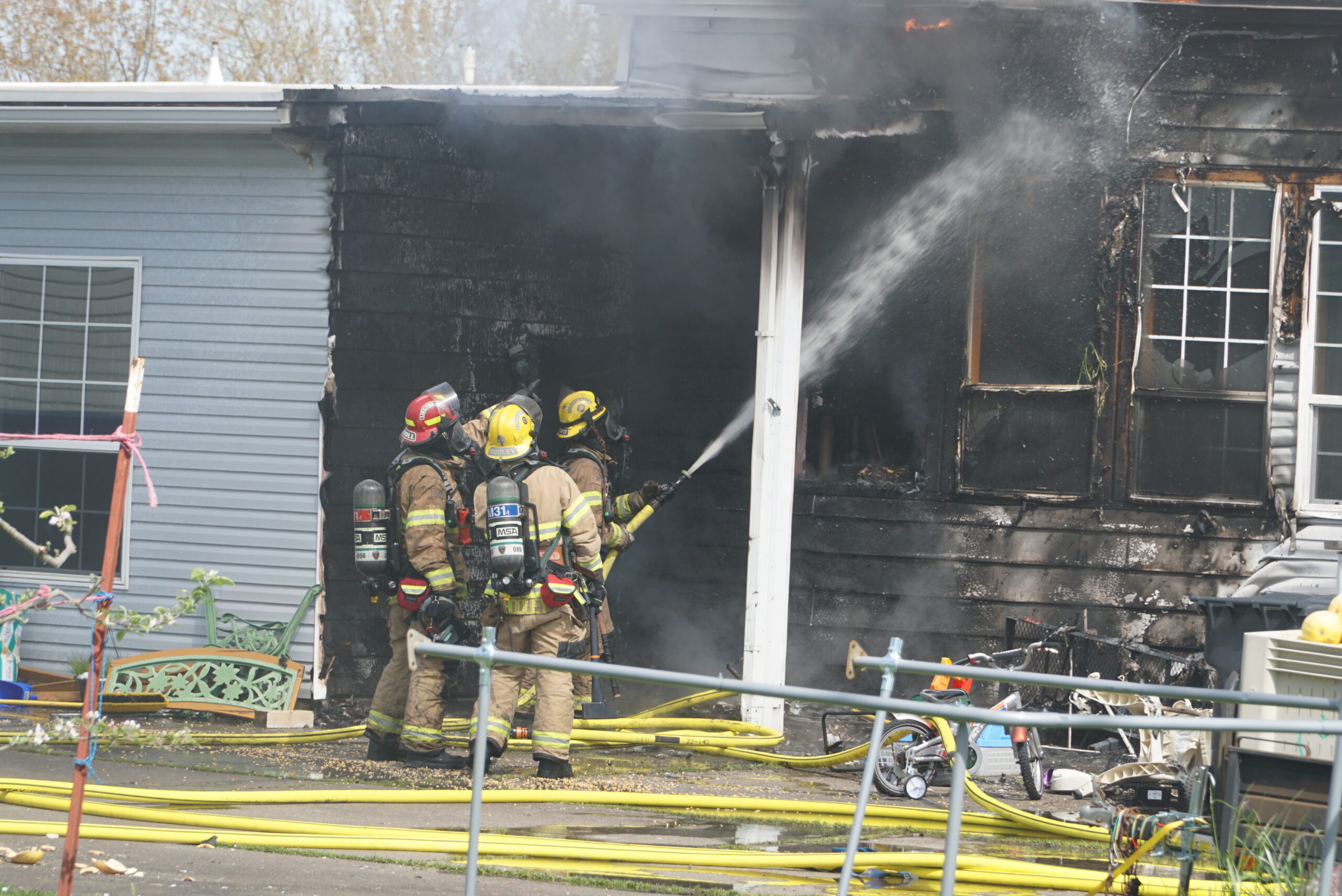 Firefighters battle house fire at Denny School, Sandridge roads ...